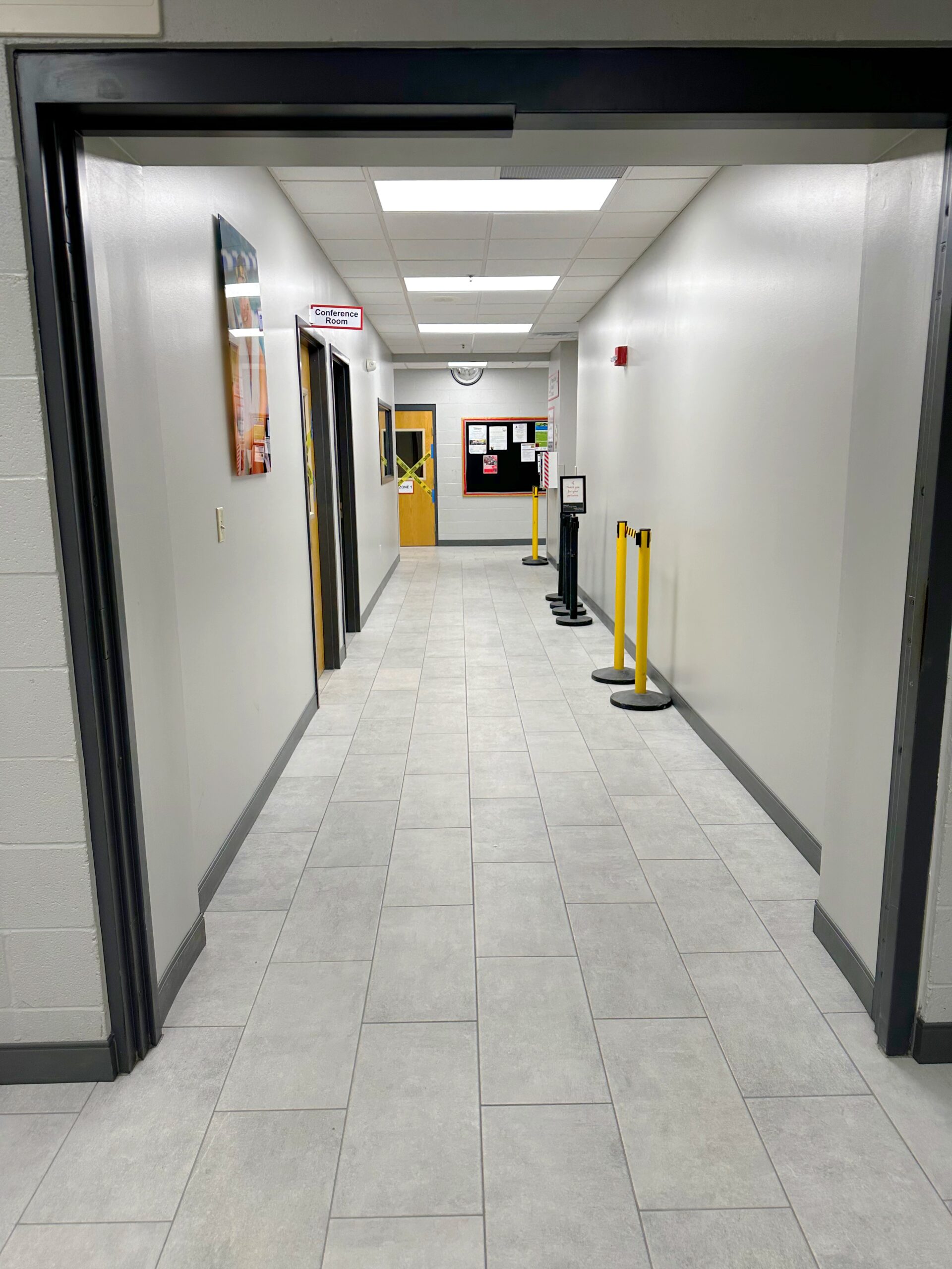 Hallway with Trim Facing Water Fountains – Lititz Rec